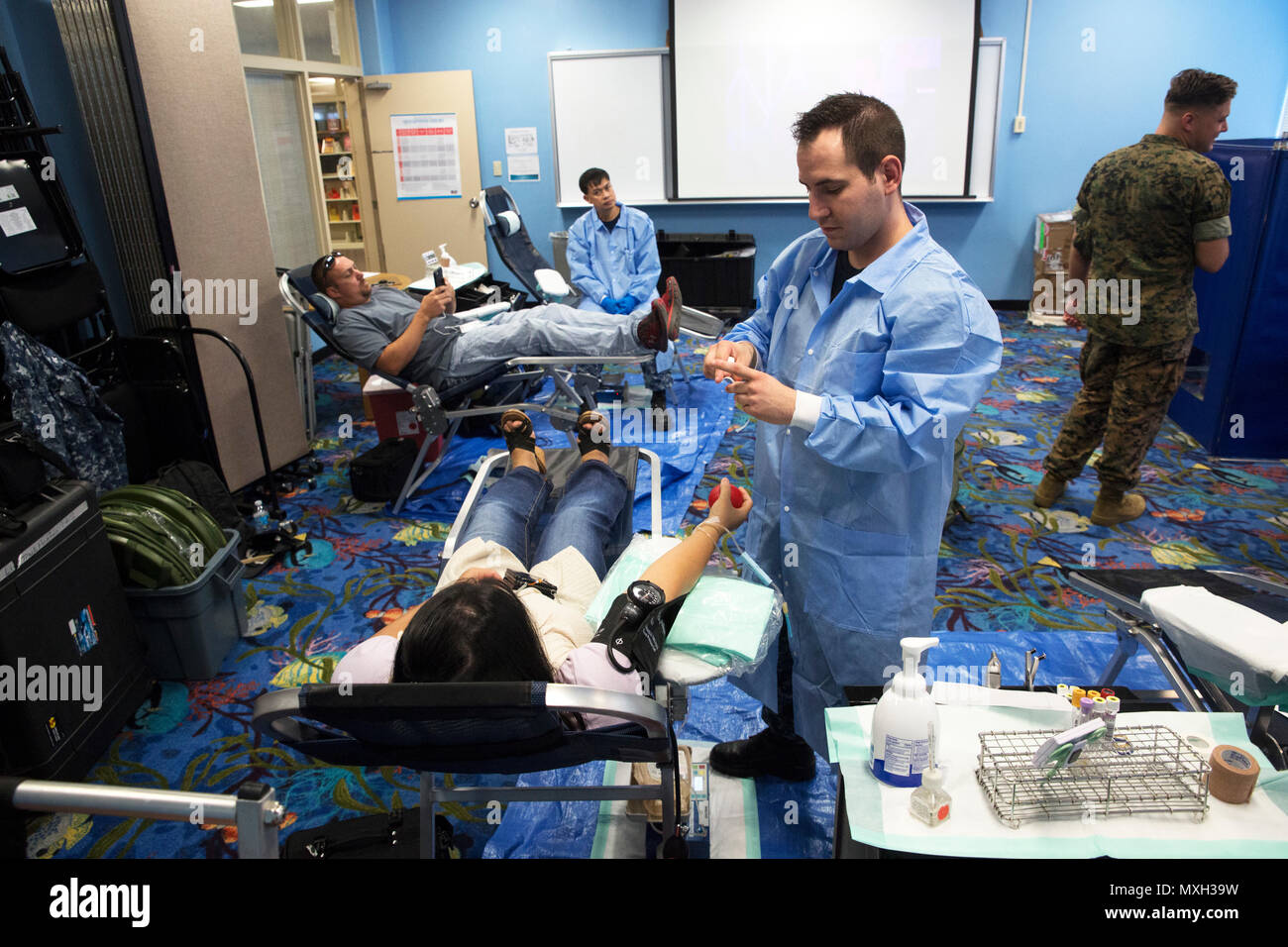 Blood screening asia hi-res stock photography and images - Alamy