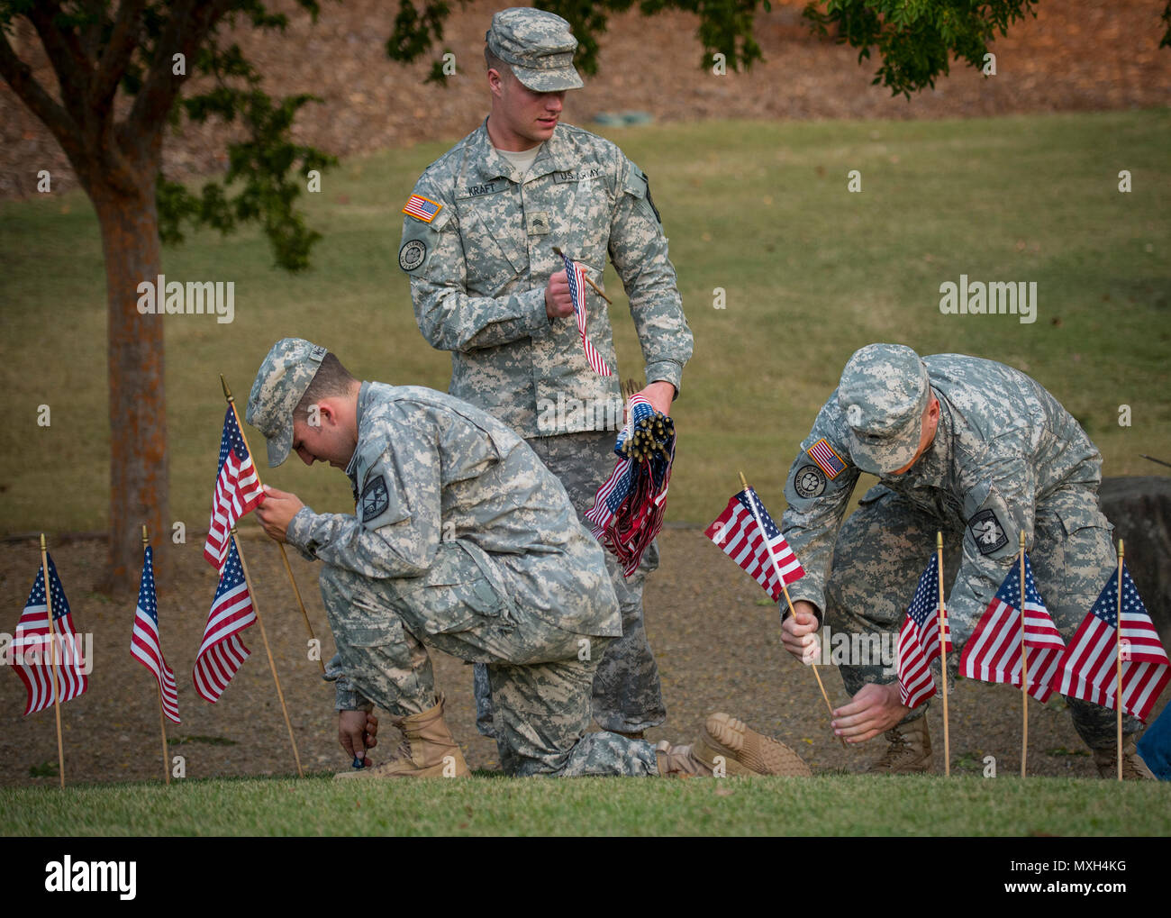 Cadets with Clemson University’s Army ROTC place American flags around ...