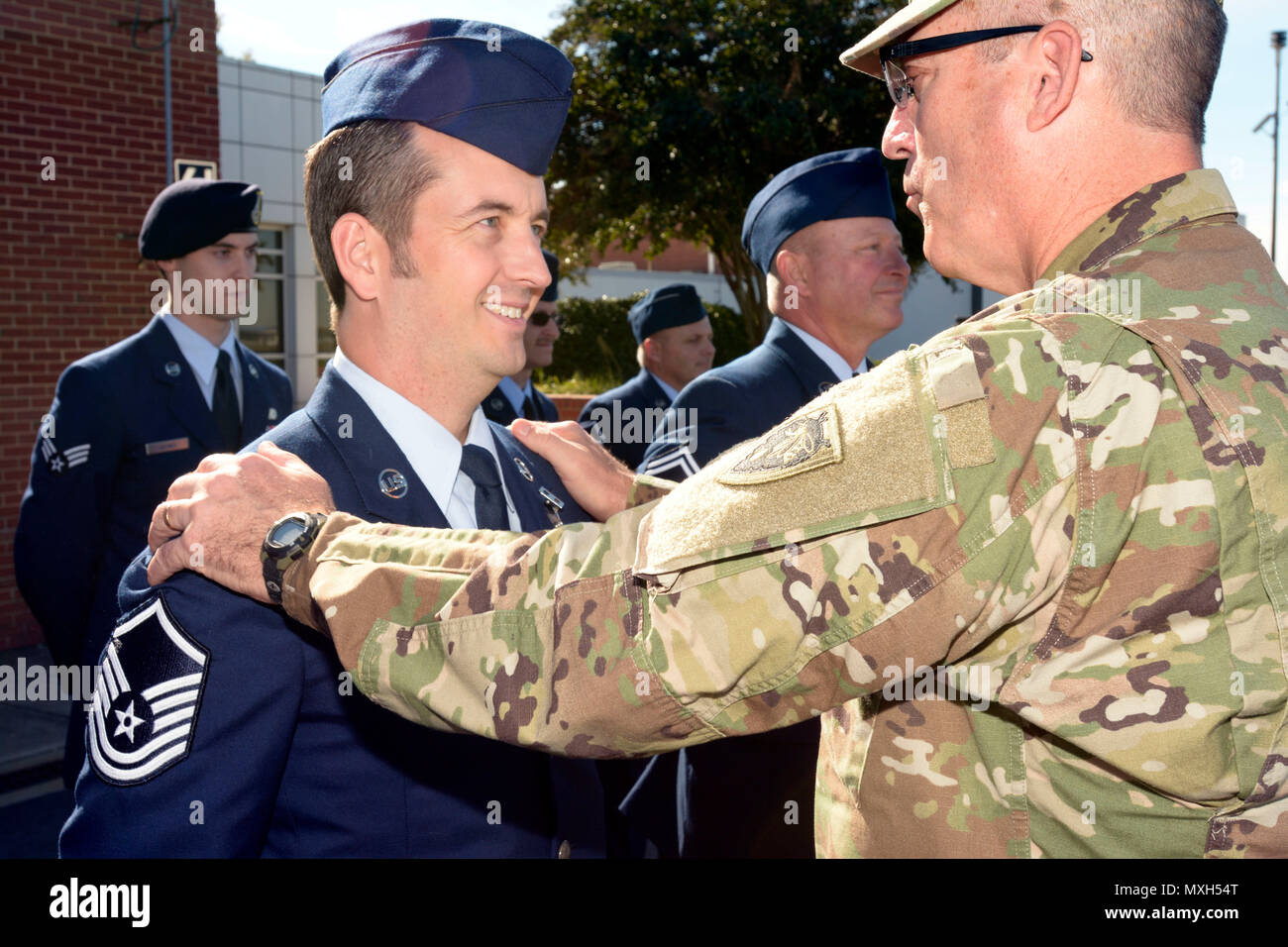 U.S. Army Maj. Gen. Greg Lusk (right), adjutant general of North ...