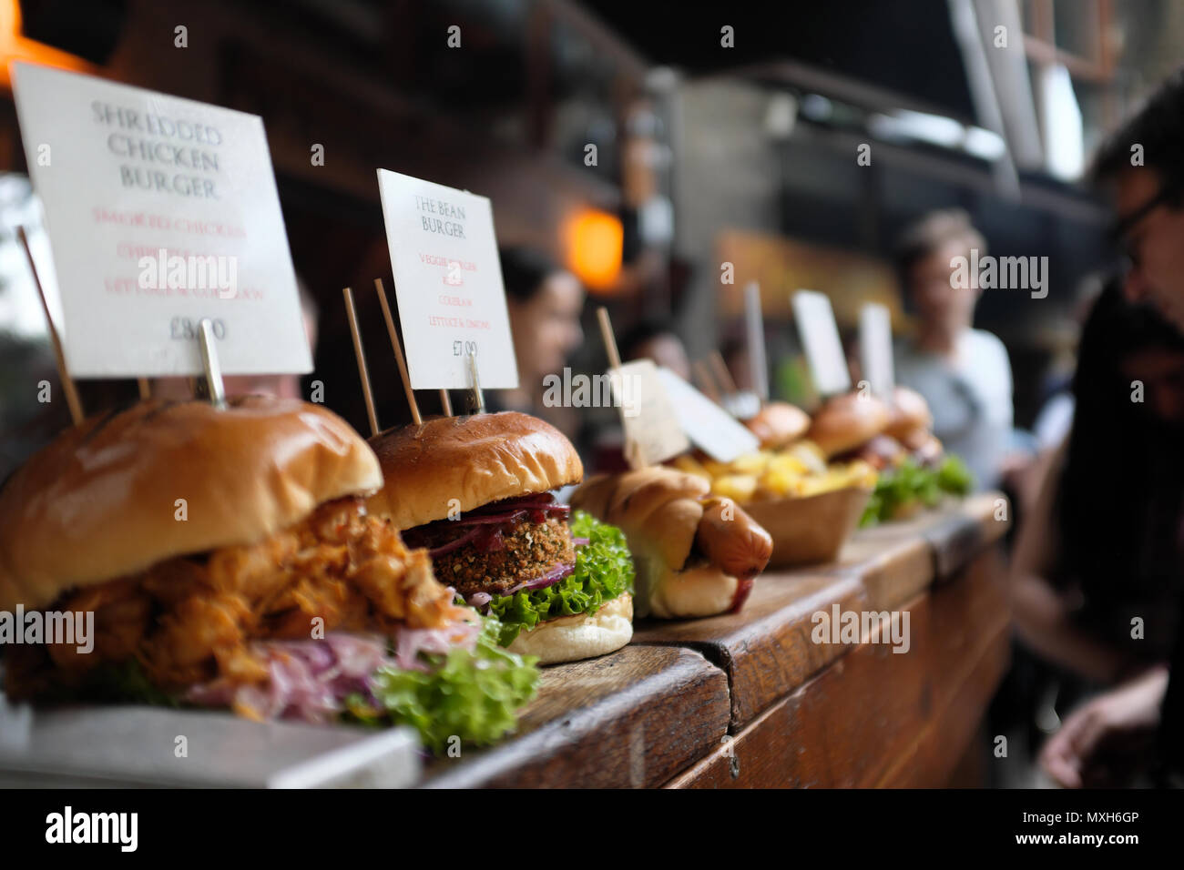 Burgers on display at Borough Market in Southwark, London, England, UK ...