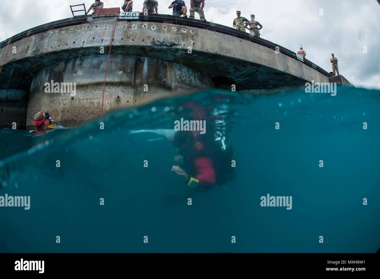 Members of Underwater Construction Team (UCT) 2's Construction Dive ...