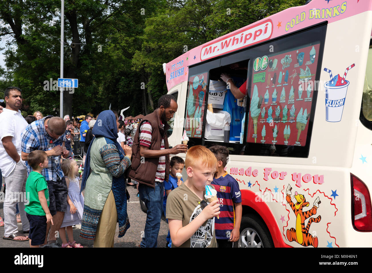 People buying ice cream from an Ice Cream Van in Luton, Bedfordshire ...