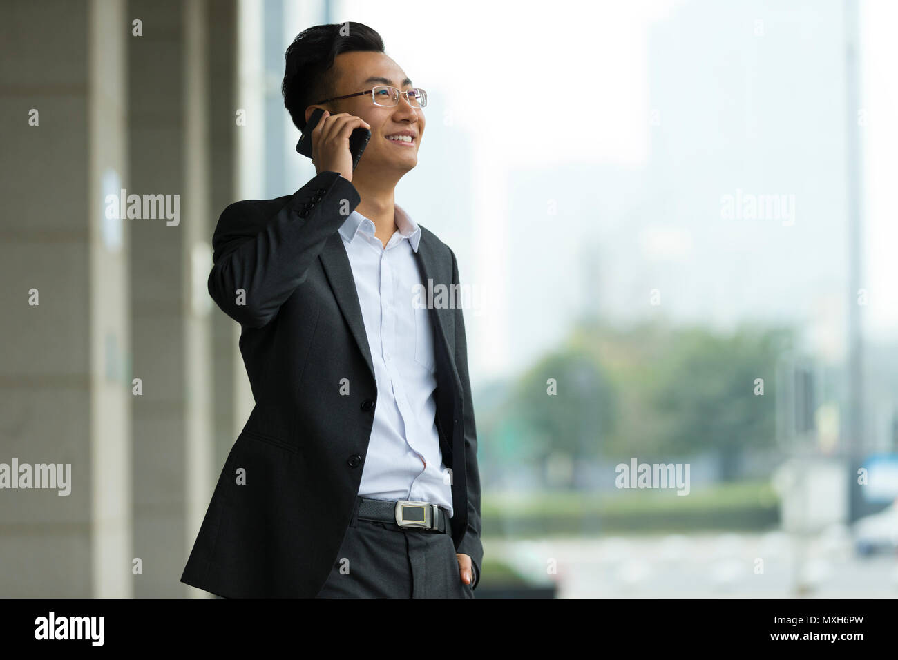 Portrait young businessman talking hi-res stock photography and images ...