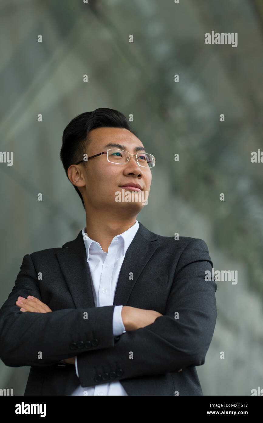 Young chinese man portrait hi-res stock photography and images - Alamy