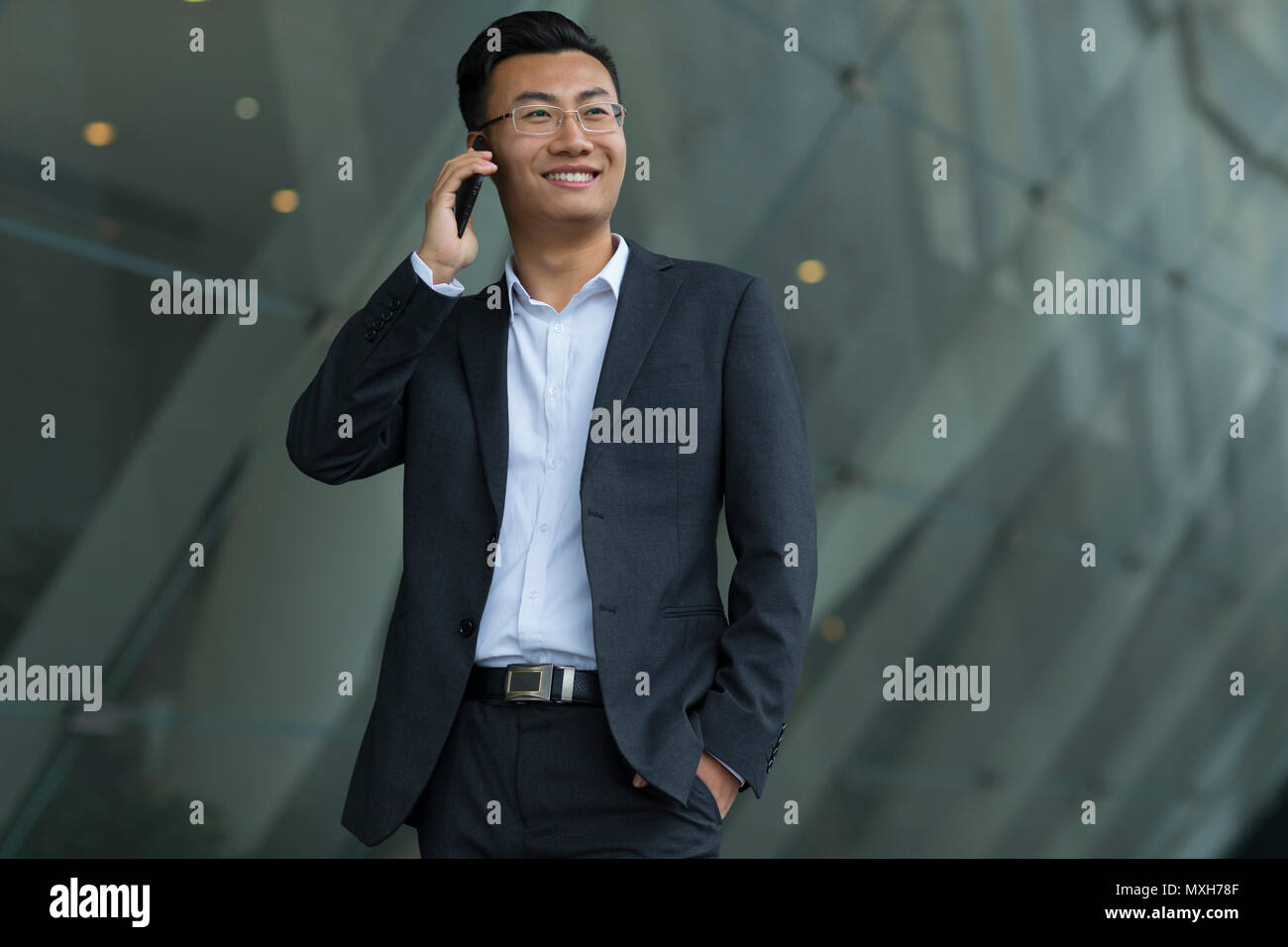 Portrait young businessman talking hi-res stock photography and images ...