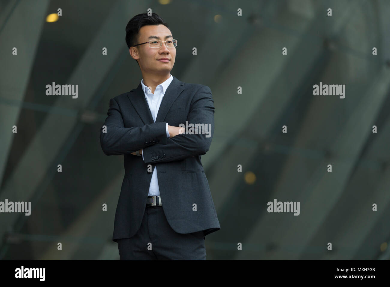 Young asian male executive hi-res stock photography and images - Alamy
