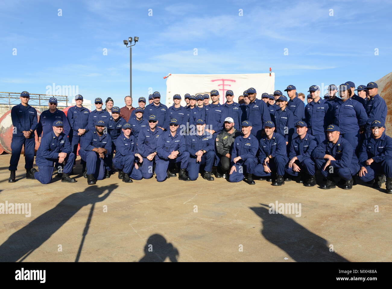 Members of Coast Guard Sector Delaware Bay pose with Jon Dorenbos, a ...