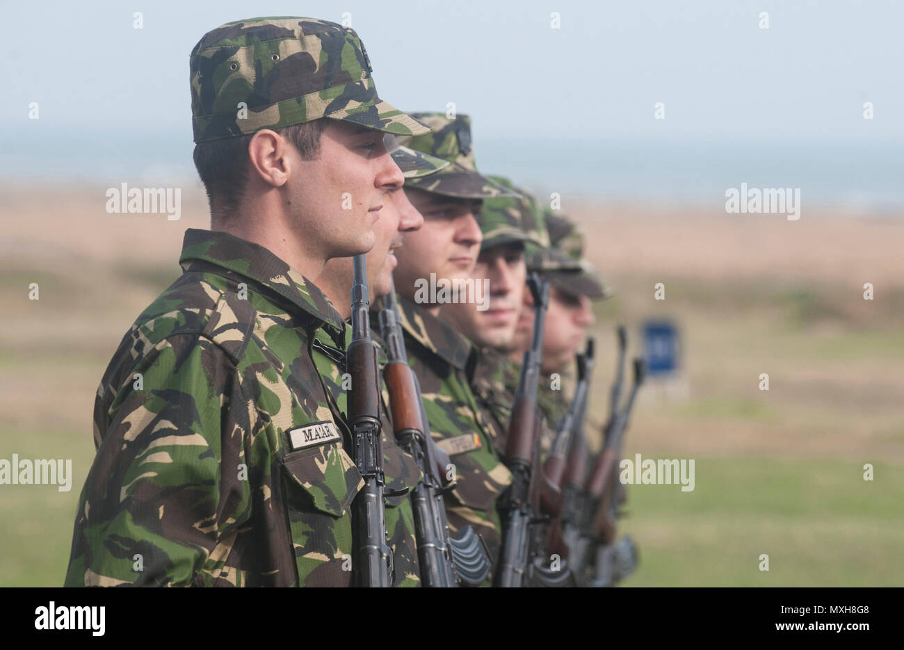 Members of the Romanian Air Force stand in formation during a 10th Army ...