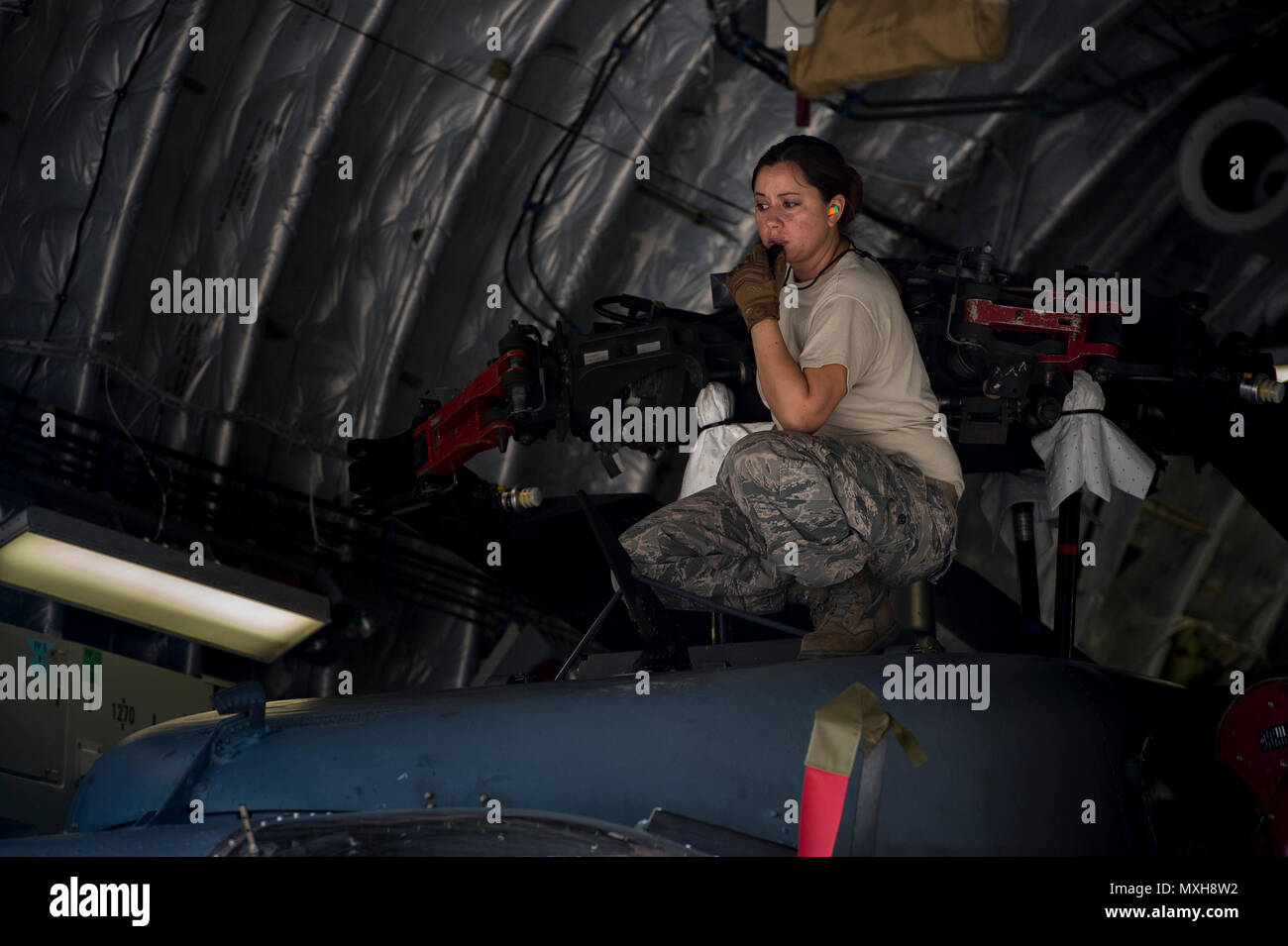 Tech. Sgt. Amiee Whitehurst, 41st Helicopter Maintenance Unit, watches ...