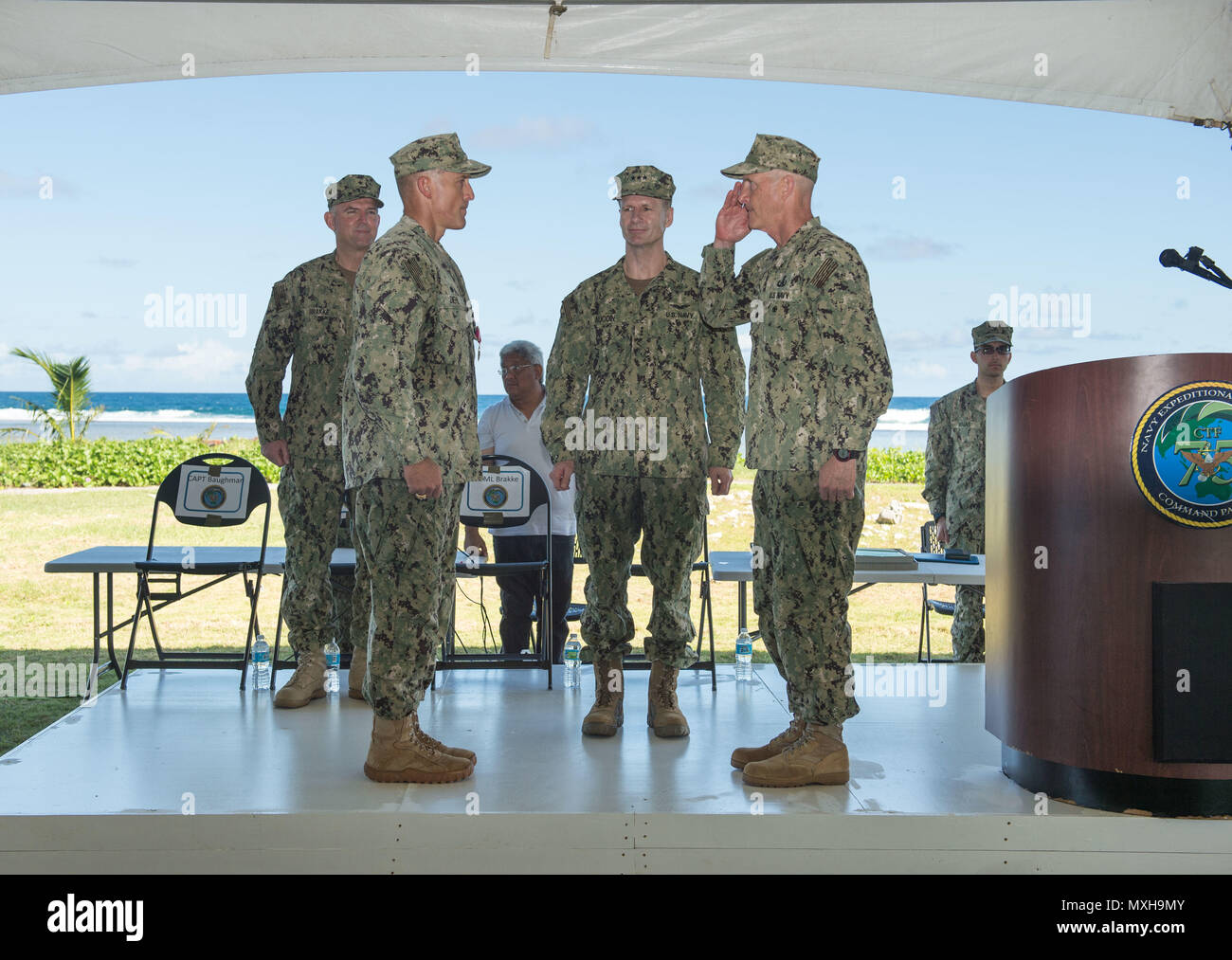 Capt. Robert A. Baughman (right) relieves Capt. Erich W. Diehl as ...