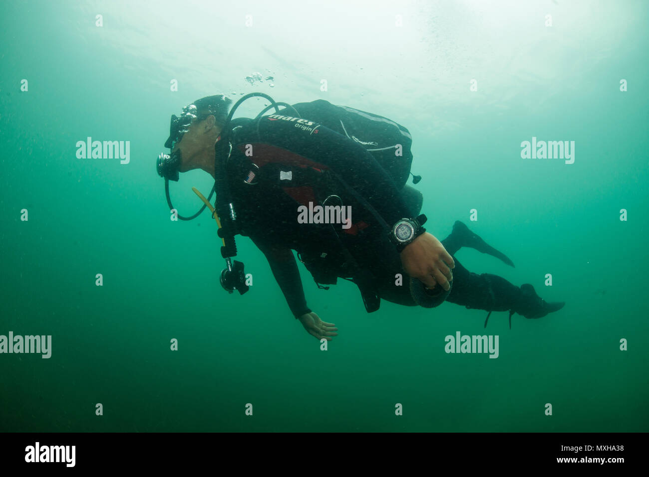 Chief Petty Officer Albert Alejo, assigned to Mobile Diving Salvage ...