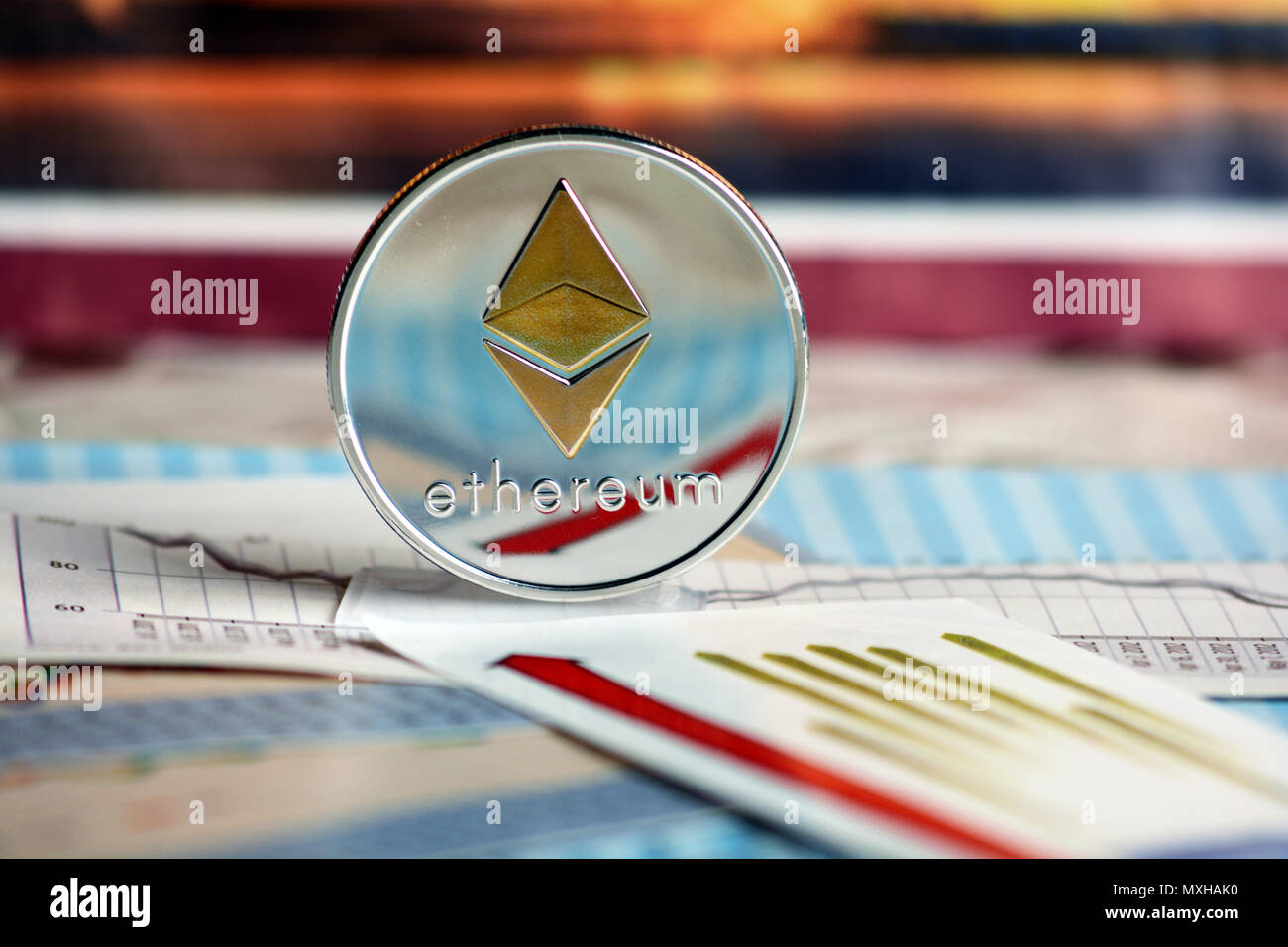 Ethereum coin on graph and diagrams background. concept of trading ...