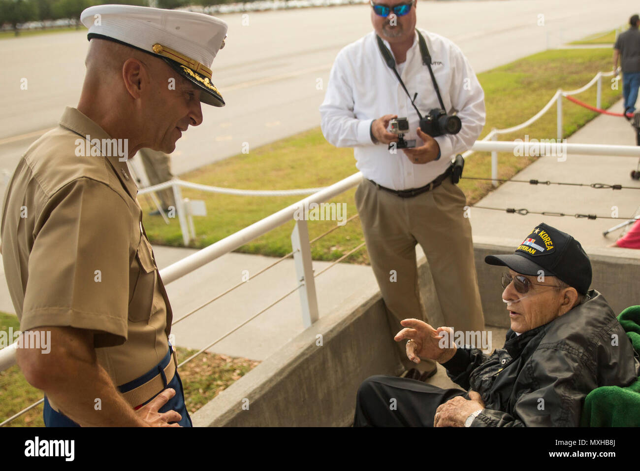 Larry L. Cooper Jr., right, speaks with Col. Matthew St. Clair ...