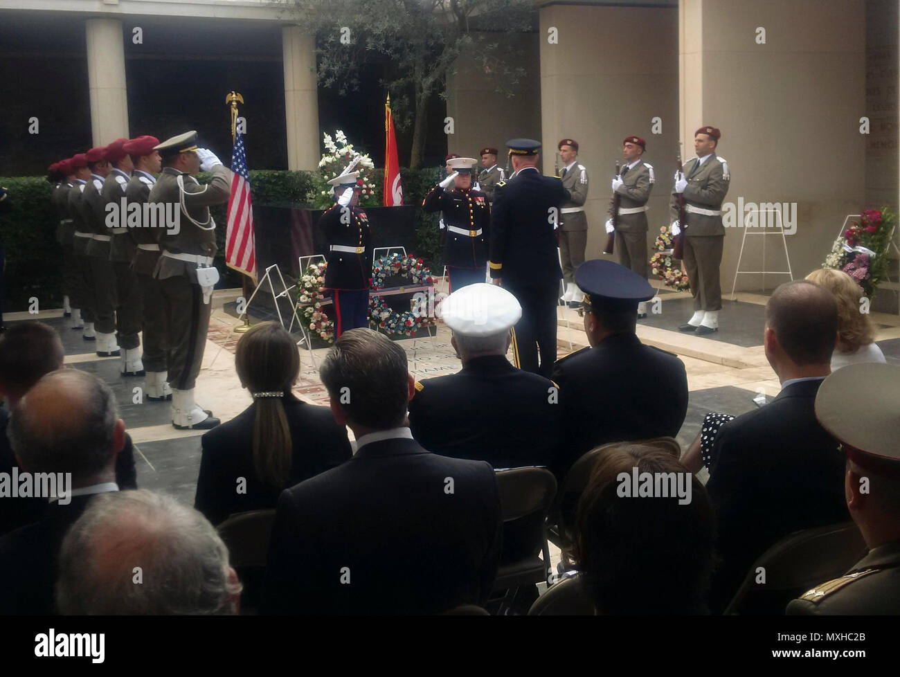 Maj. Gen. Joseph Harrington, commander of U.S. Army Africa renders a ...