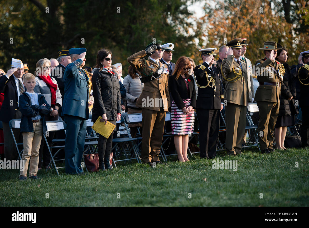 Attendees listen to speakers during a memorial service for General of ...