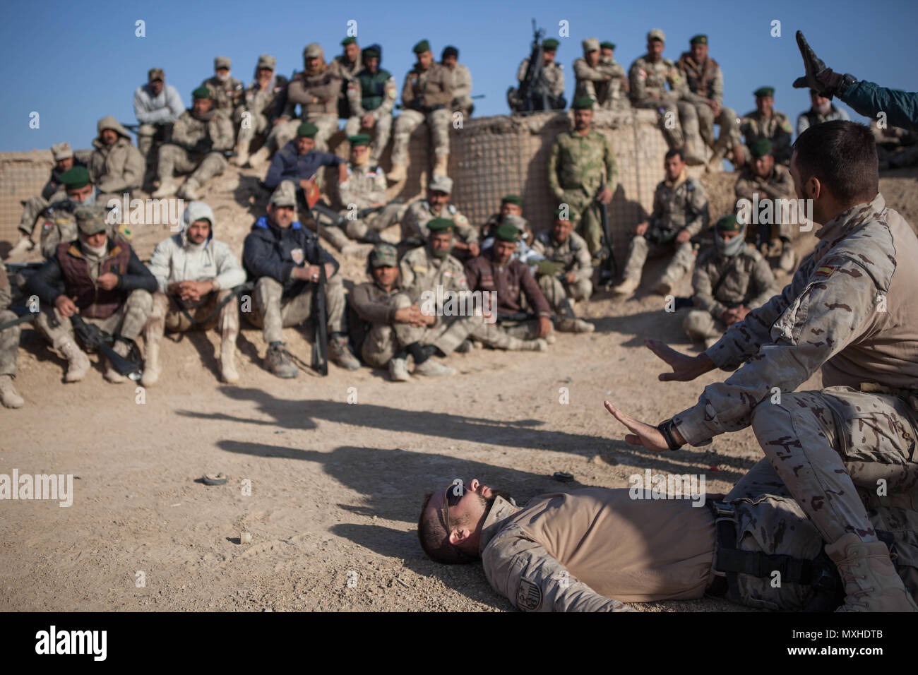 Spanish trainers show Iraqi security forces how to perform tactical ...