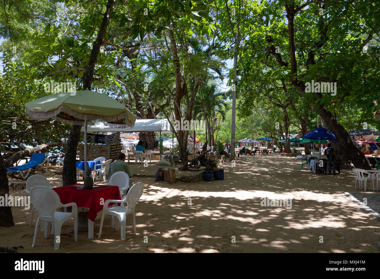 Relaxing beach scene in the islands Stock Photo - Alamy