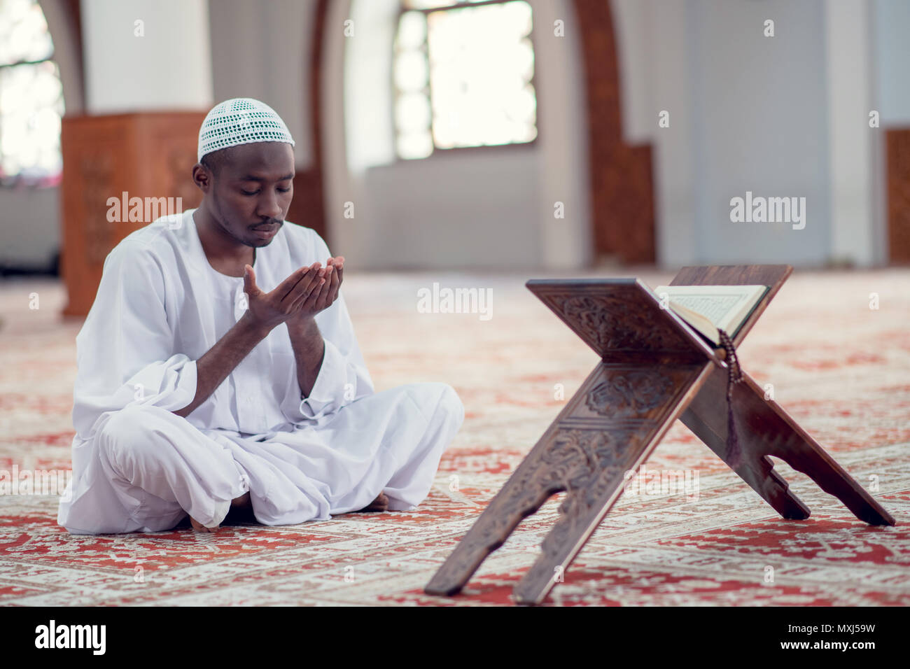 African Muslim Man Making Traditional High Resolution Stock Photography ...