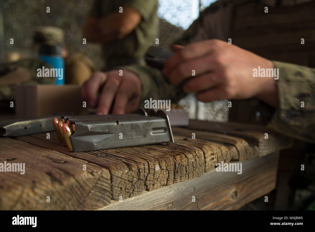 U.S. Navy Petty Officer 3rd Class Kevin Outzen, assigned to ...