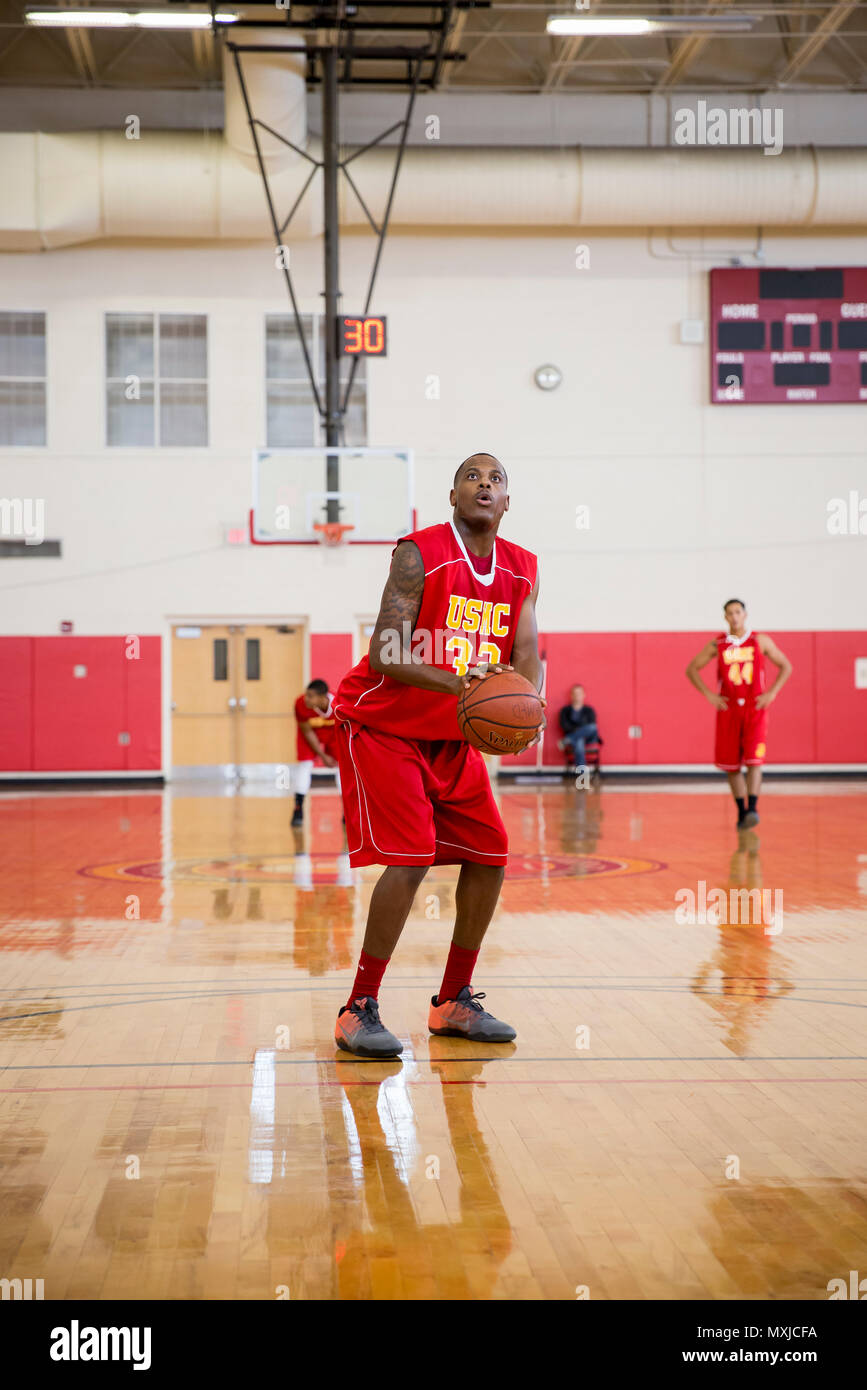 U.S. Marine Corps Sgt. Kenan Montonio of the All Marine basketball team ...