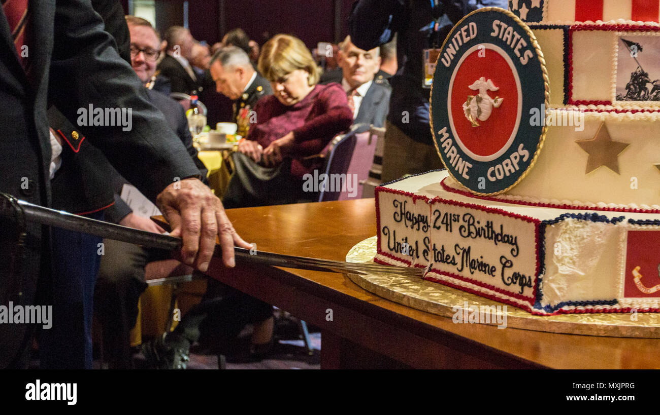 Thomas J. Lyons, founder of the Semper Fidelis Society, cuts a birthday ...