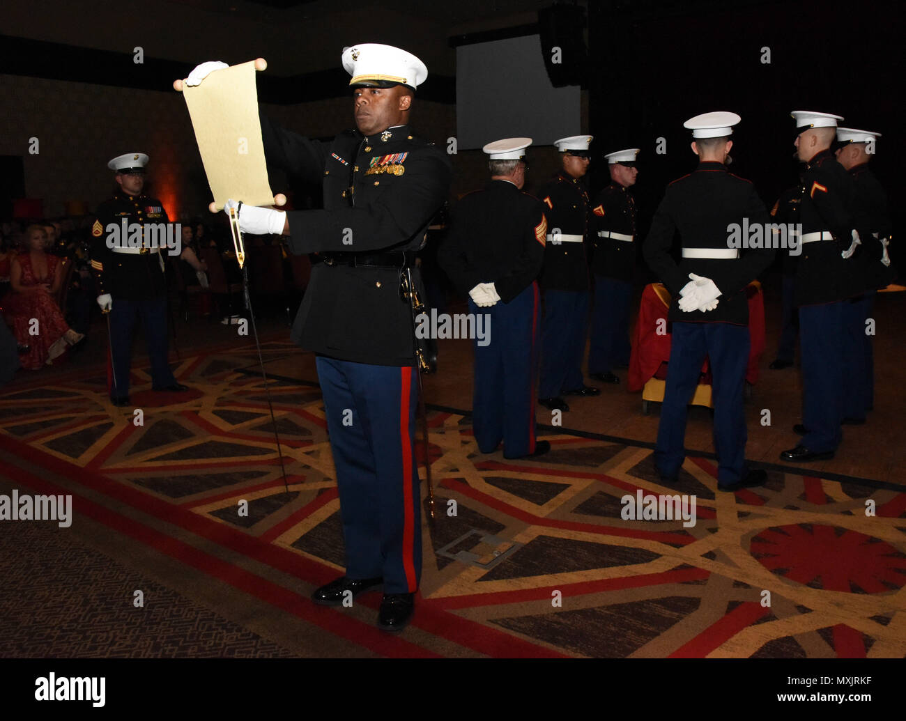 Capt. Ivory Johnson, Keesler Marine Detachment executive officer, reads ...