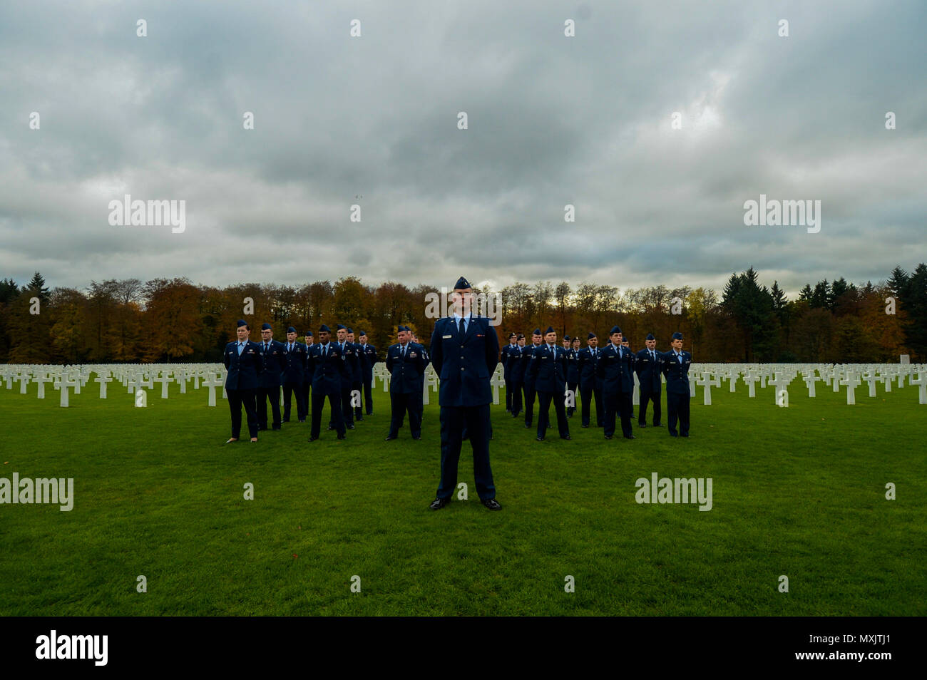 A detail of Airmen assigned to the 52nd Fighter Wing stand at parade ...