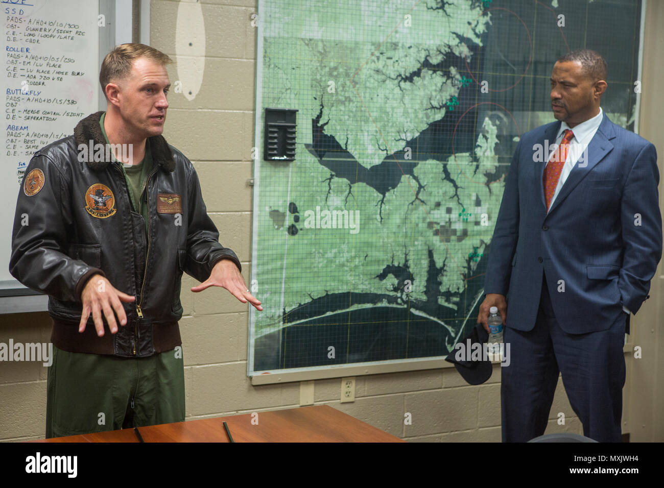 U.S. Marine Corps Maj. Tyler B. Sanders, left, an instructor pilot ...