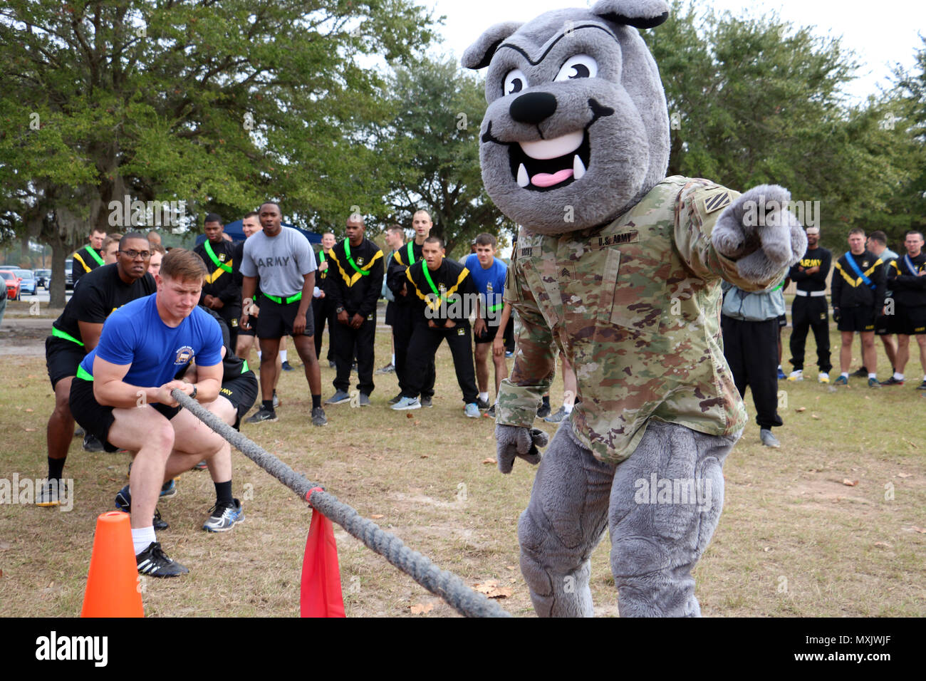 Sgt. Rocky (right), mascot of 3rd Infantry Division, checks to see if ...