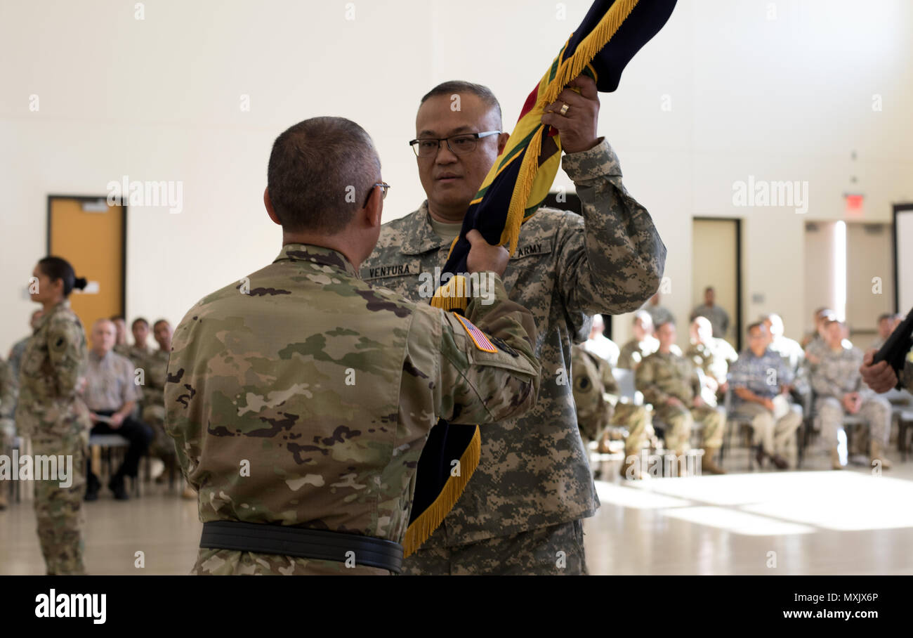 Brig. Gen. Keith Y. Tamashiro hands the Hawaii Army National Guard ...