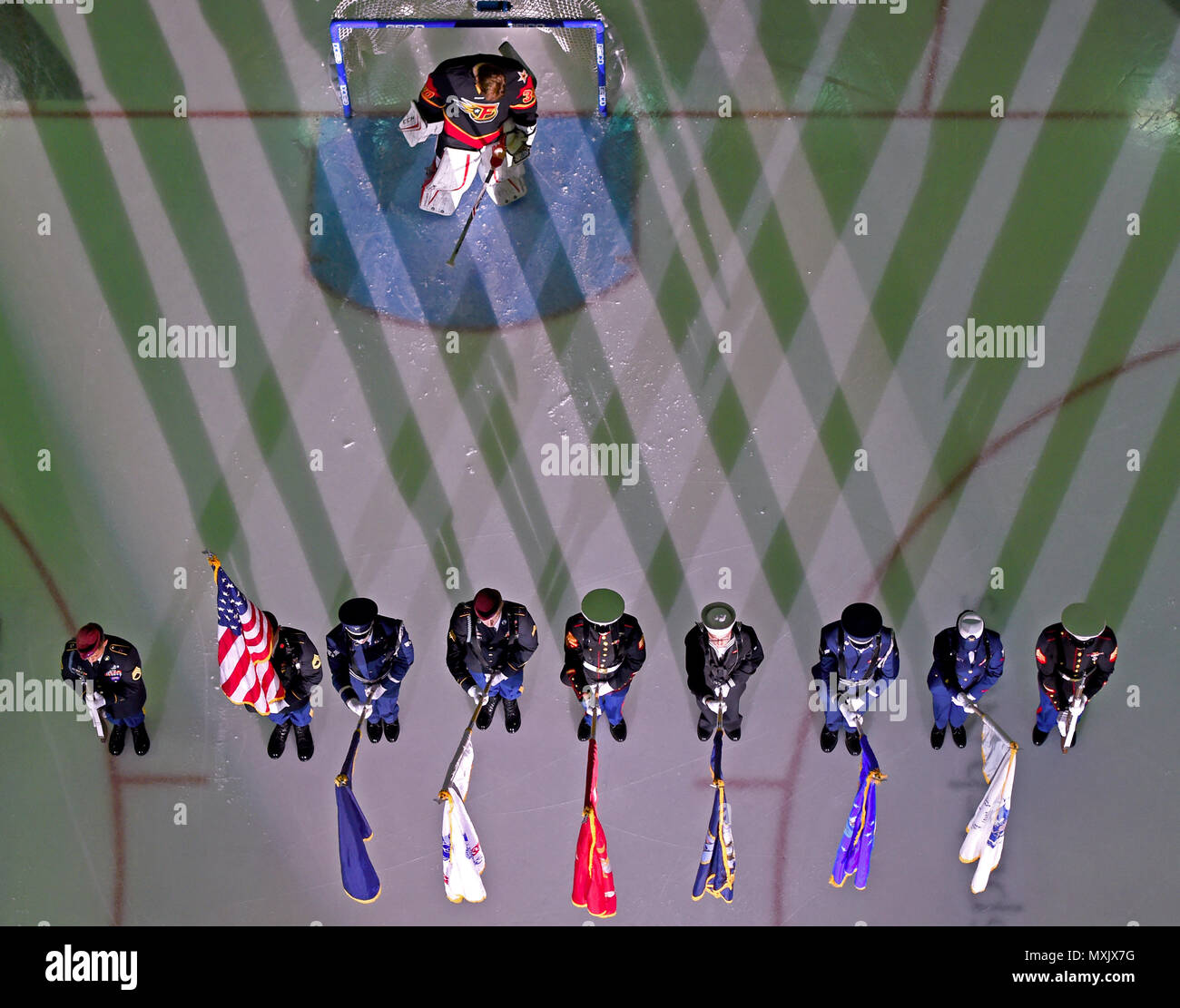 The Joint Services Color Guard presents the colors during an Alaska ...