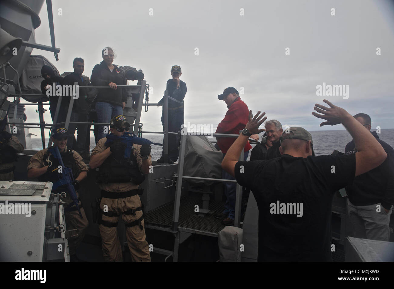 PACIFIC OCEAN (Nov. 12, 2016) Tiger cruise participants observe a visit ...