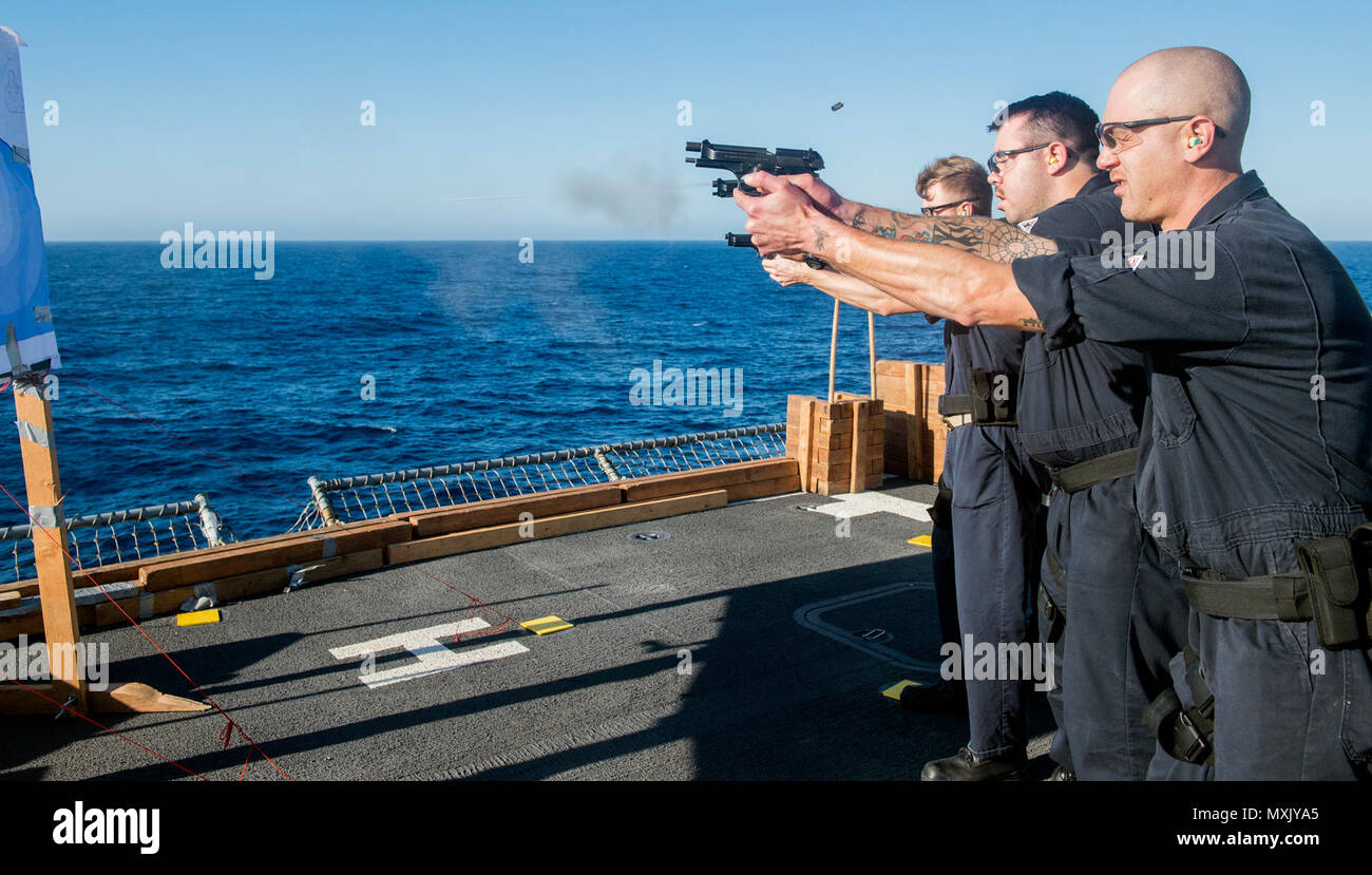 161113-N-FT178-243 PACIFIC OCEAN (Nov. 13, 2016) Sailors fire 9mm ...