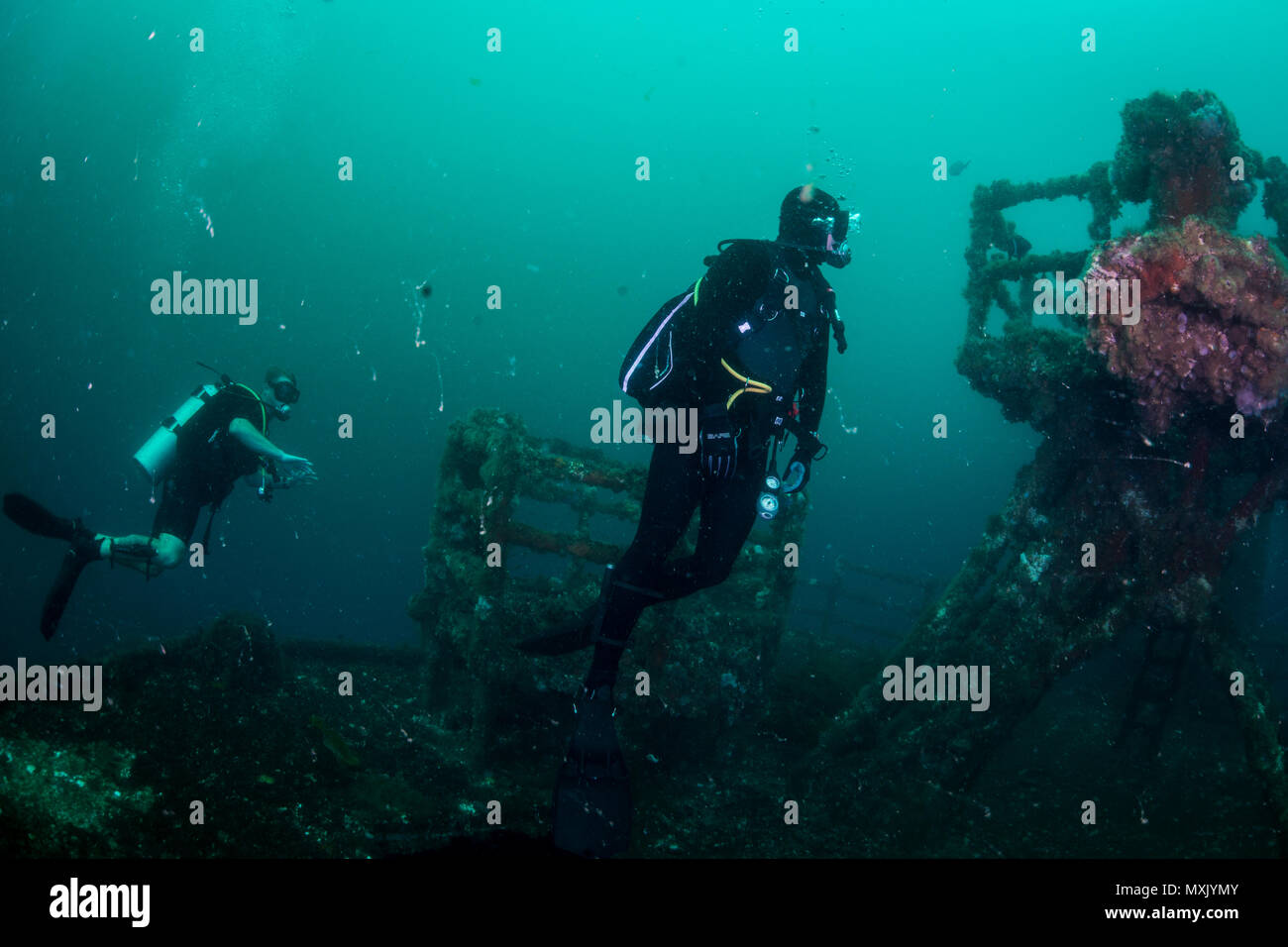 Master Chief Petty Officer Bill Costin and Petty Officer 2nd Class Alec ...