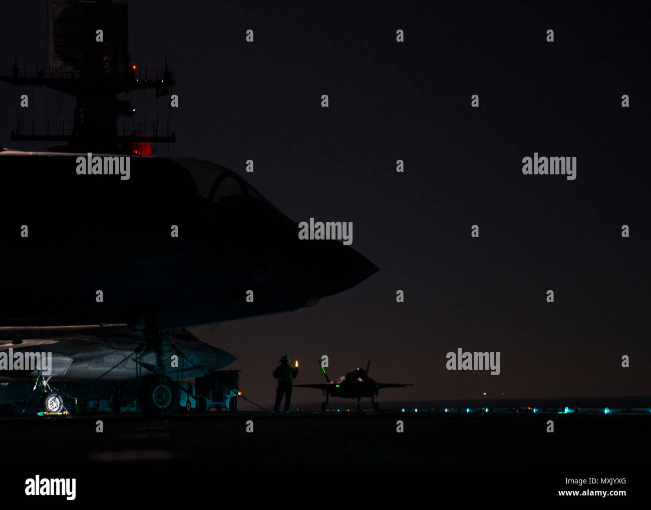 An F-35B Lightning II STOVL aircraft prepares for takeoff from USS ...