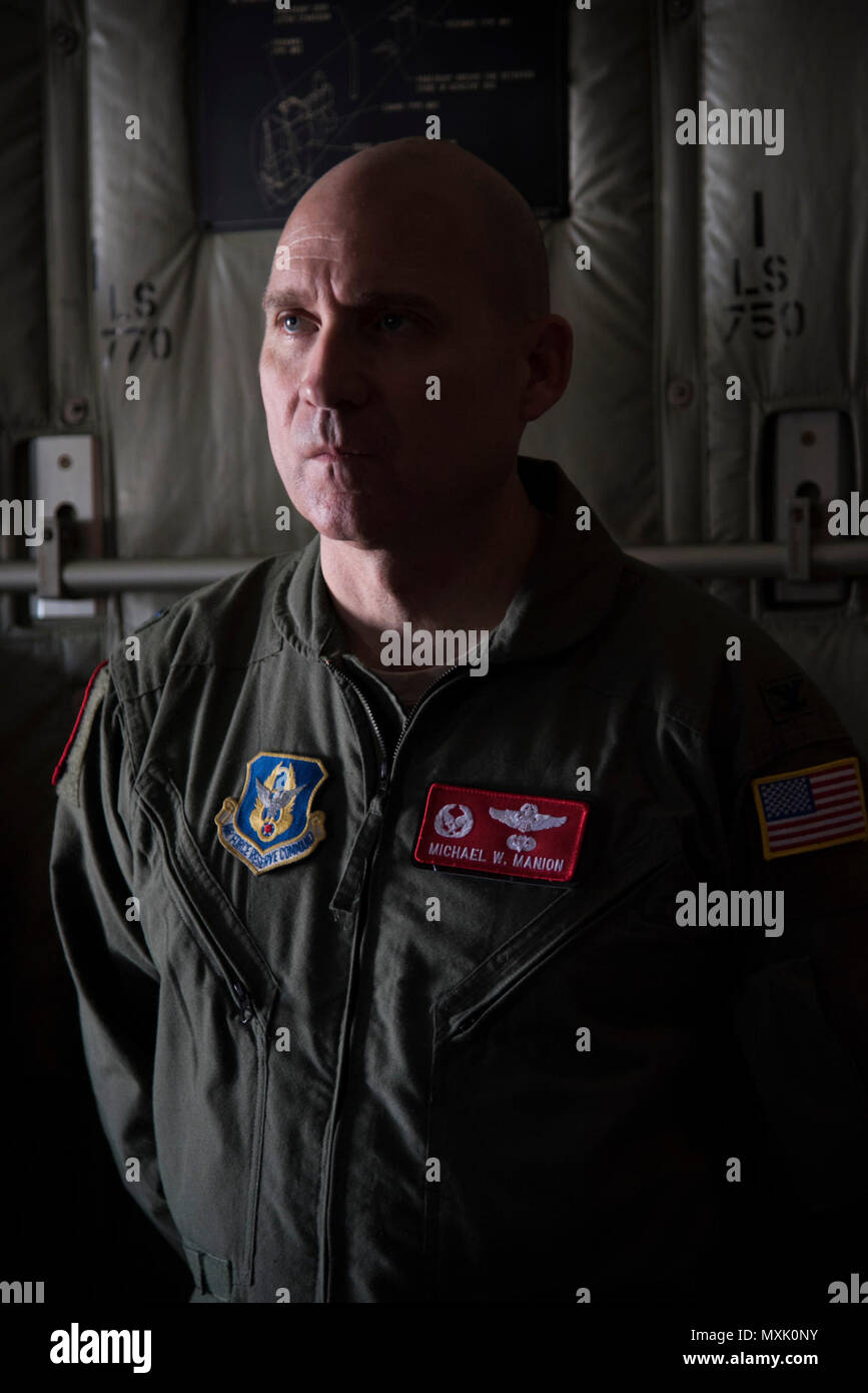 Col. Michael Manion, 403rd Wing commander listens to a mission briefing ...
