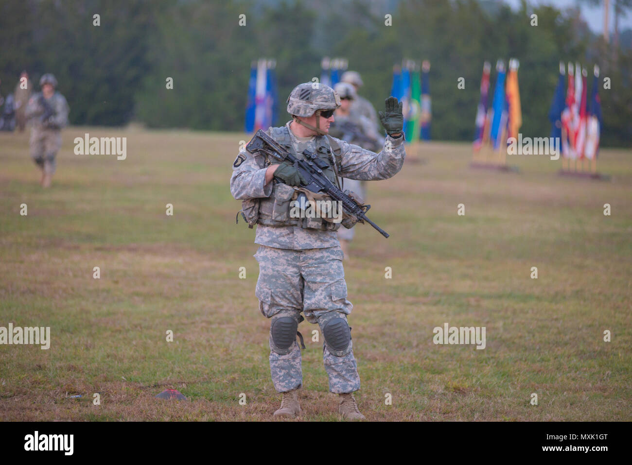 A 3rd Infantry Division infantry squad participates in Twilight Tattoo ...