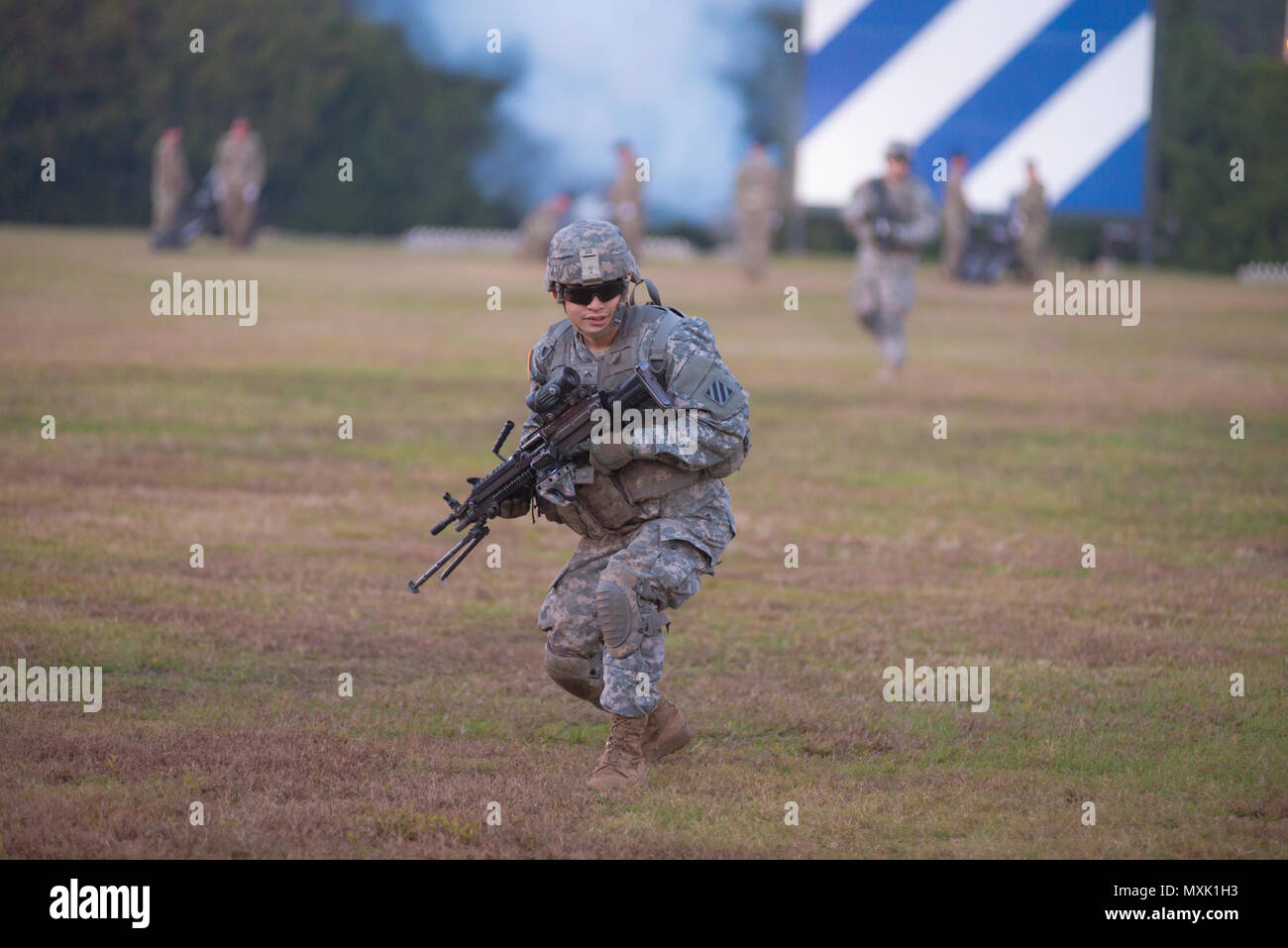 A 3rd Infantry Division infantry squad participates in Twilight Tattoo ...