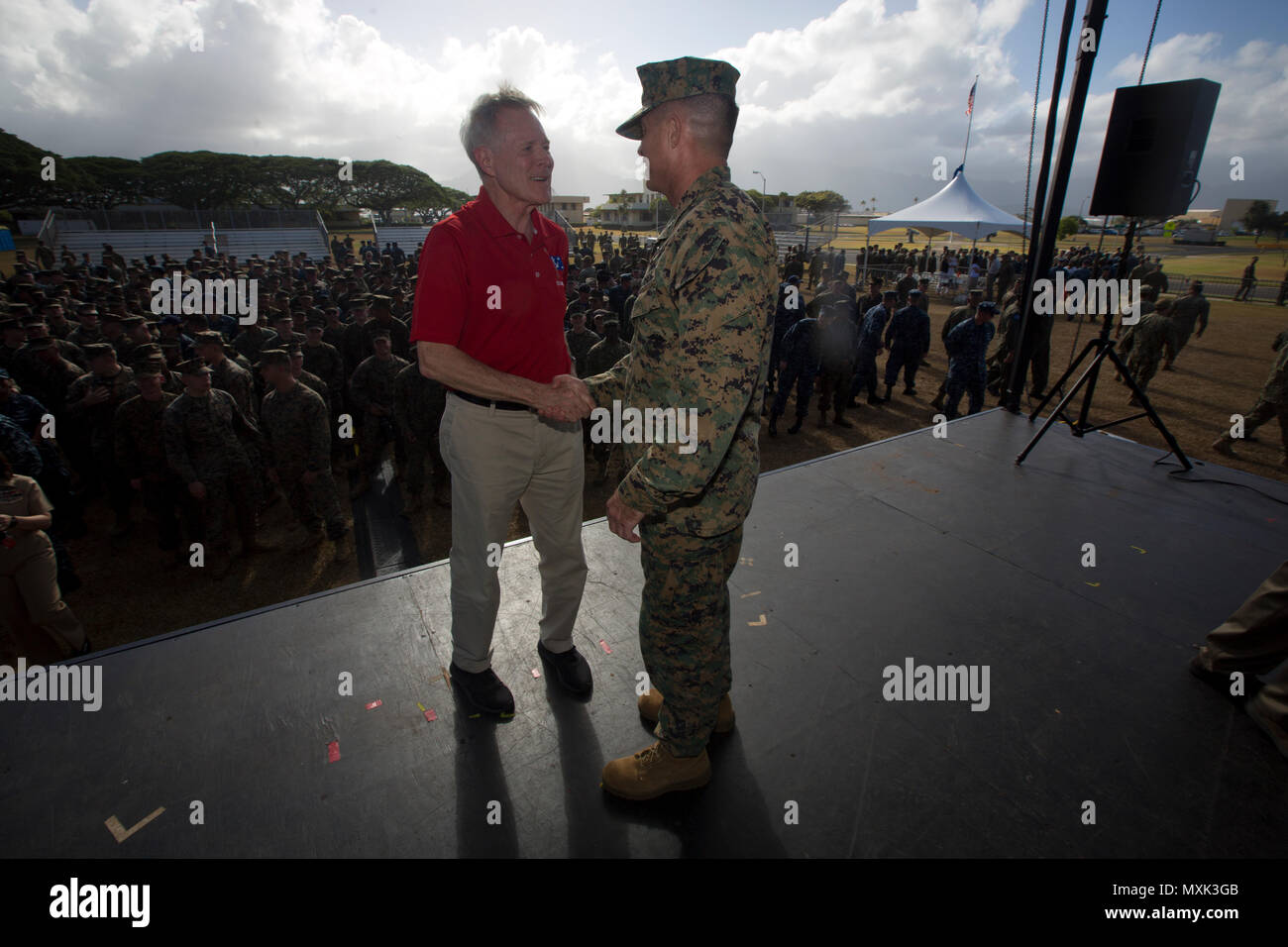 Secretary of the Navy Ray Mabus, shakes hands with Col. Sean Killeen, Commanding Officer, Marine ...