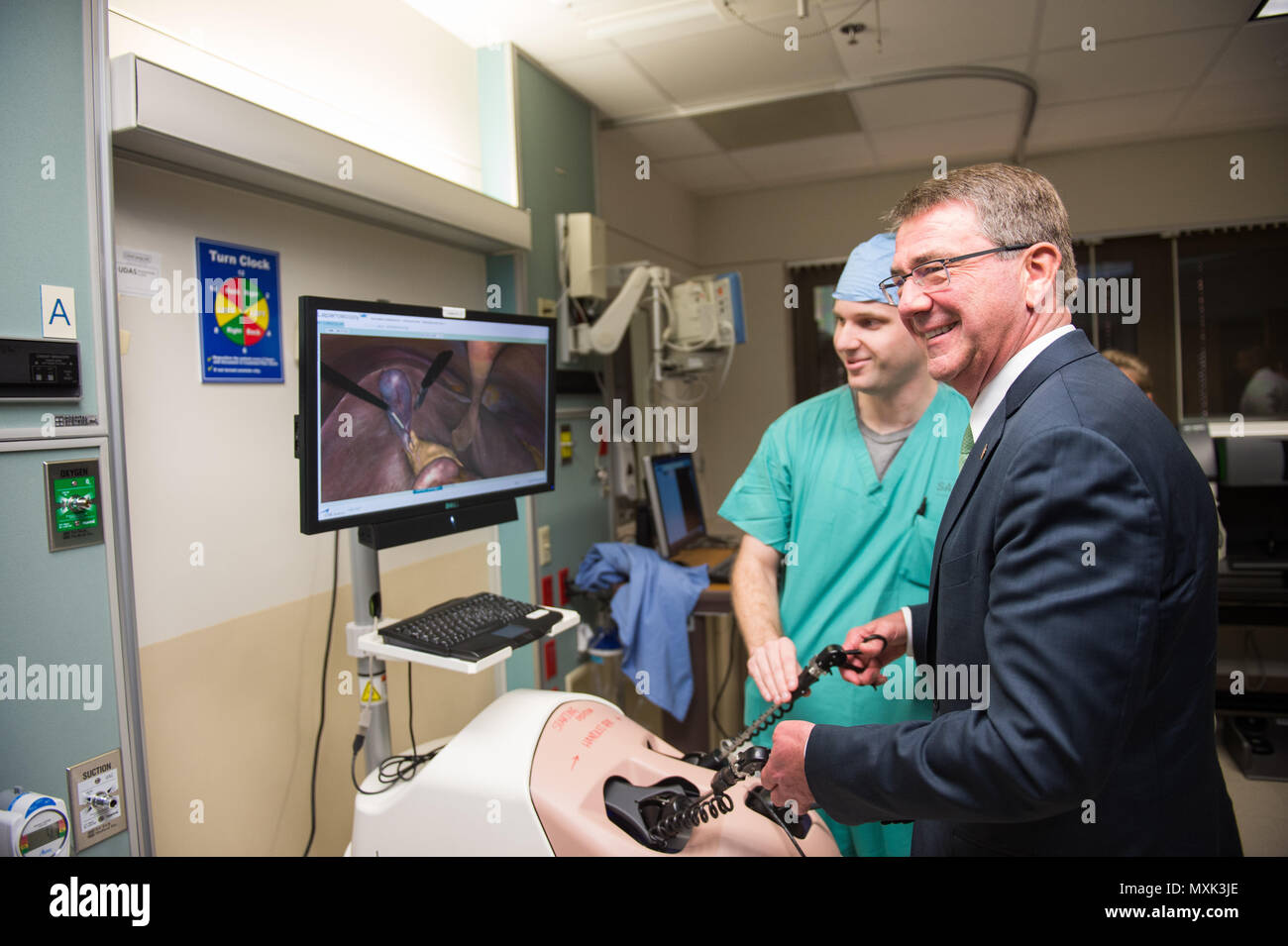 Secretary of Defense Ash Carter uses simulated medical training aides ...