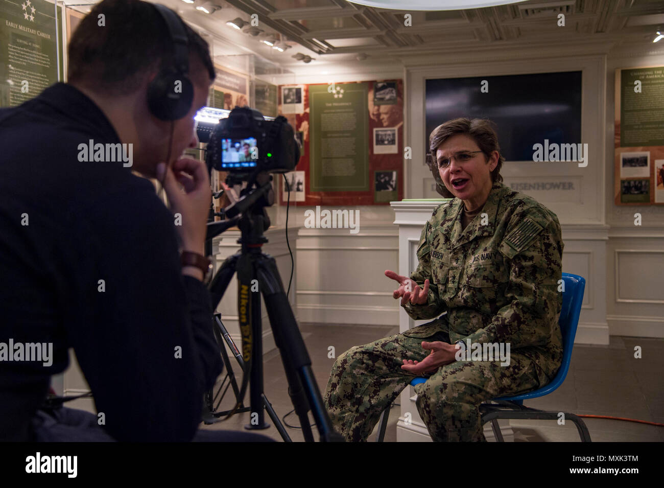 A U.S. Navy flag officer records a message in the museum aboard the ...