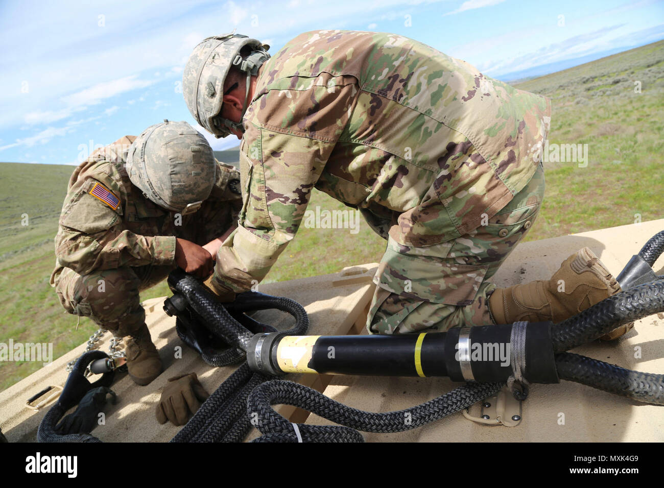 U.S. Army Sgt. Patrick Walsh and Sgt. Deron English, 21st Chemical ...