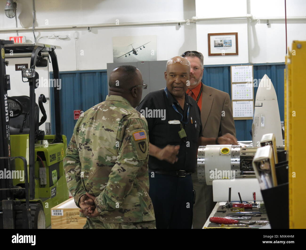Letterkenny Munitions Center employee, Mr. Herbert Bailey, briefs Brig ...