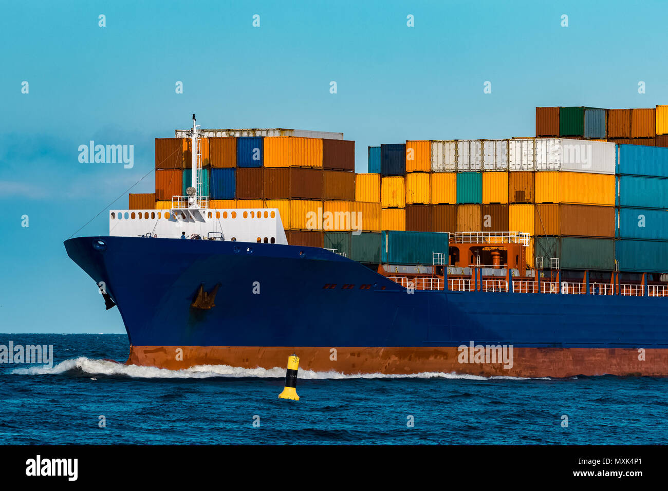 Blue container ship in travel. Logistics and freight industry Stock ...