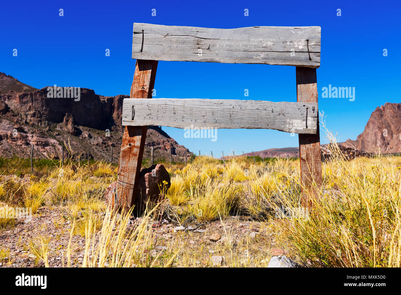 Wooden signboard in wild west Stock Photo - Alamy