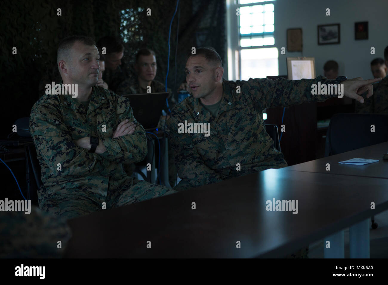U.S. Marine Corps Lt. Col. Marcus J. Mainz, right, commanding officer ...
