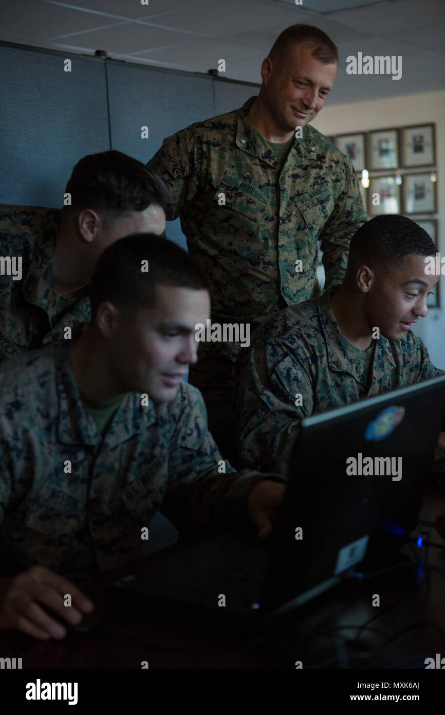 U.S. Marine Corps Col. Matthew S. Reid, center, commanding officer, 6th ...