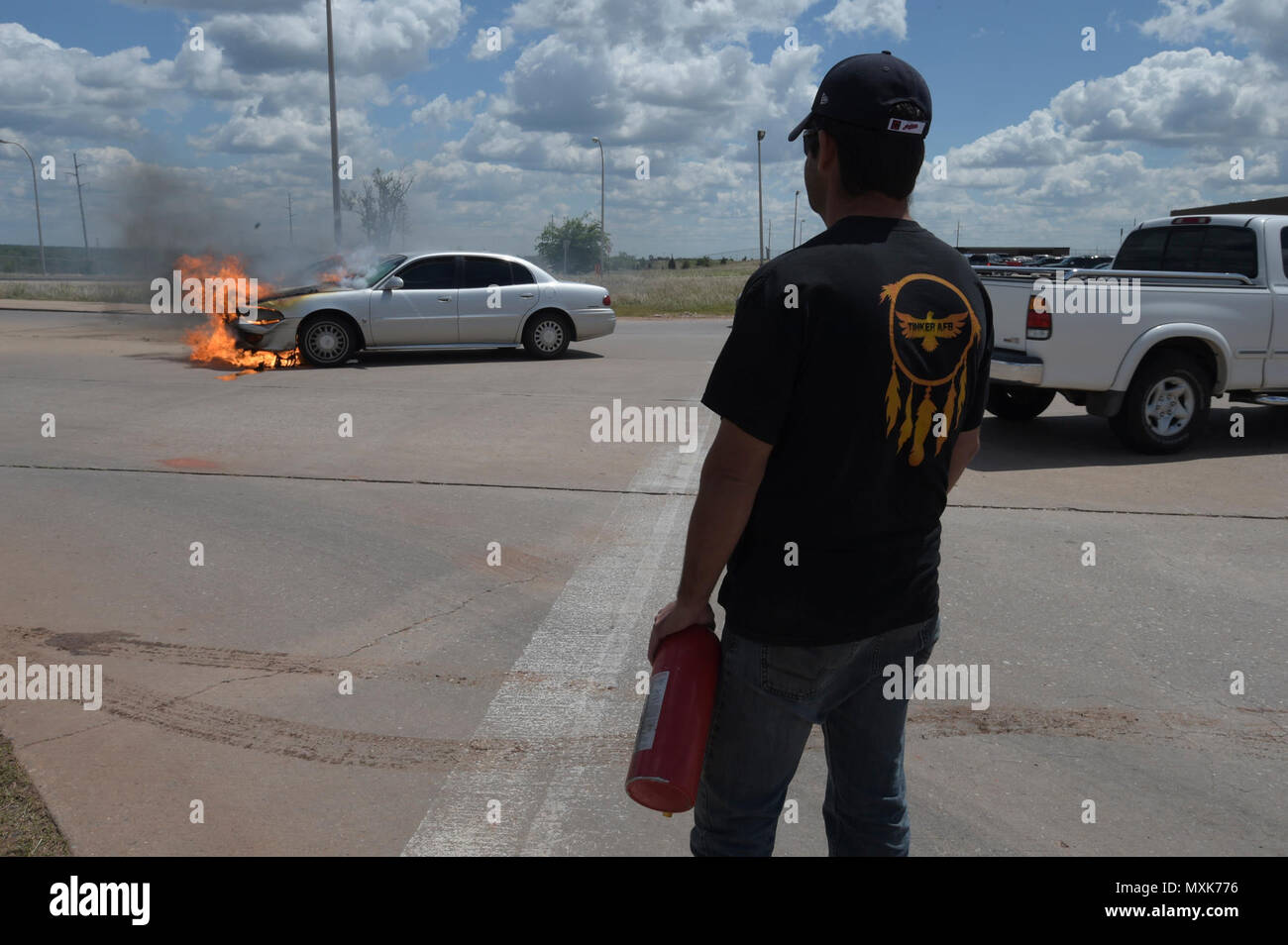 Resigning himself that he could do no more is an unidentified civilian ...