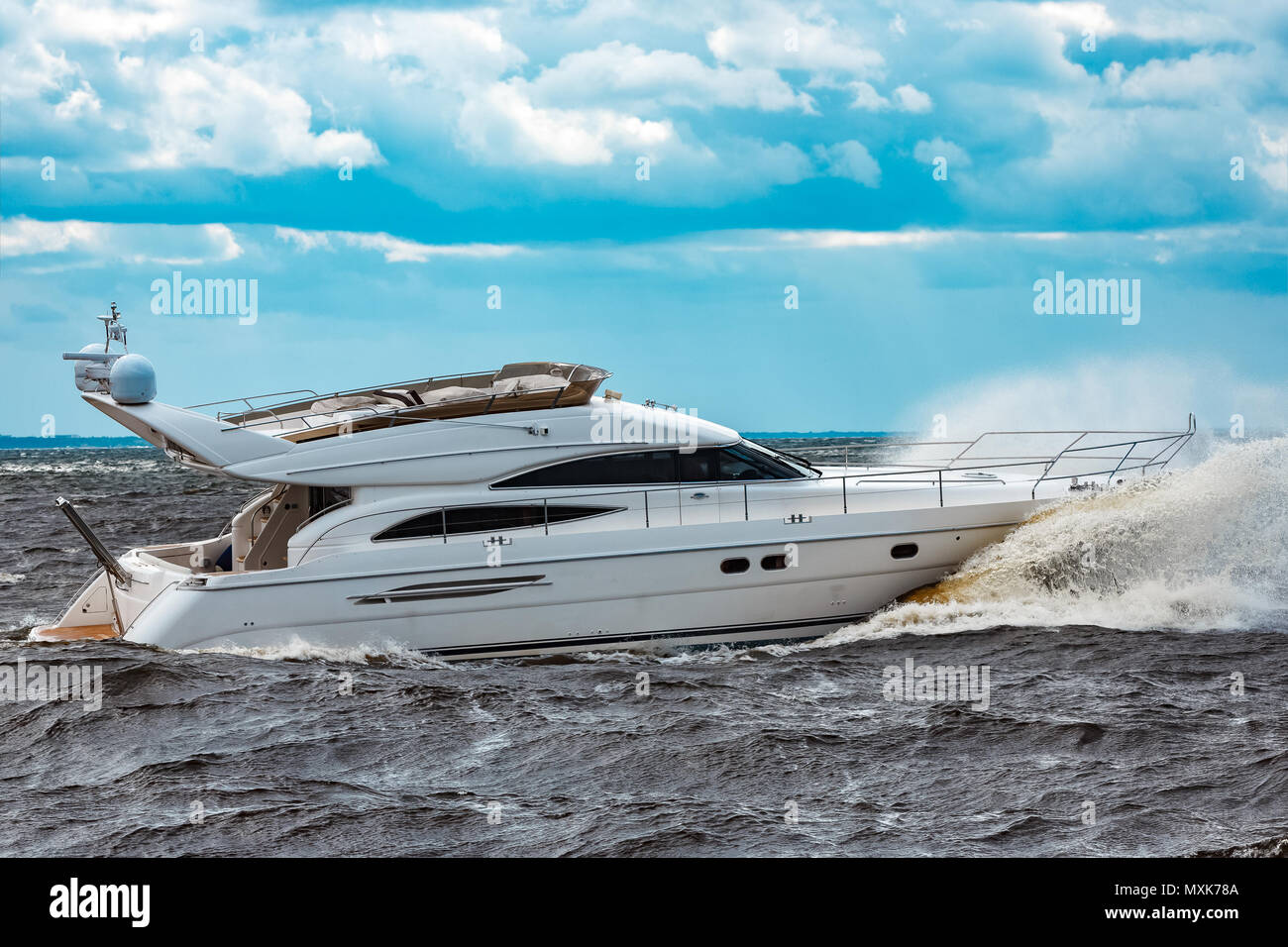 White speed boat moving fast to the Baltic sea. Water sport Stock Photo ...