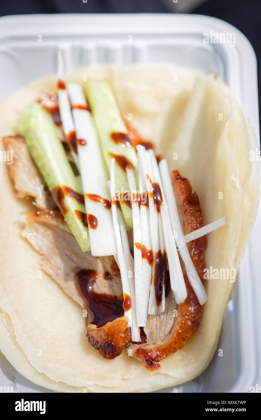 Beijing style duck pancakes with cucumber, spring onion and hoisin ...